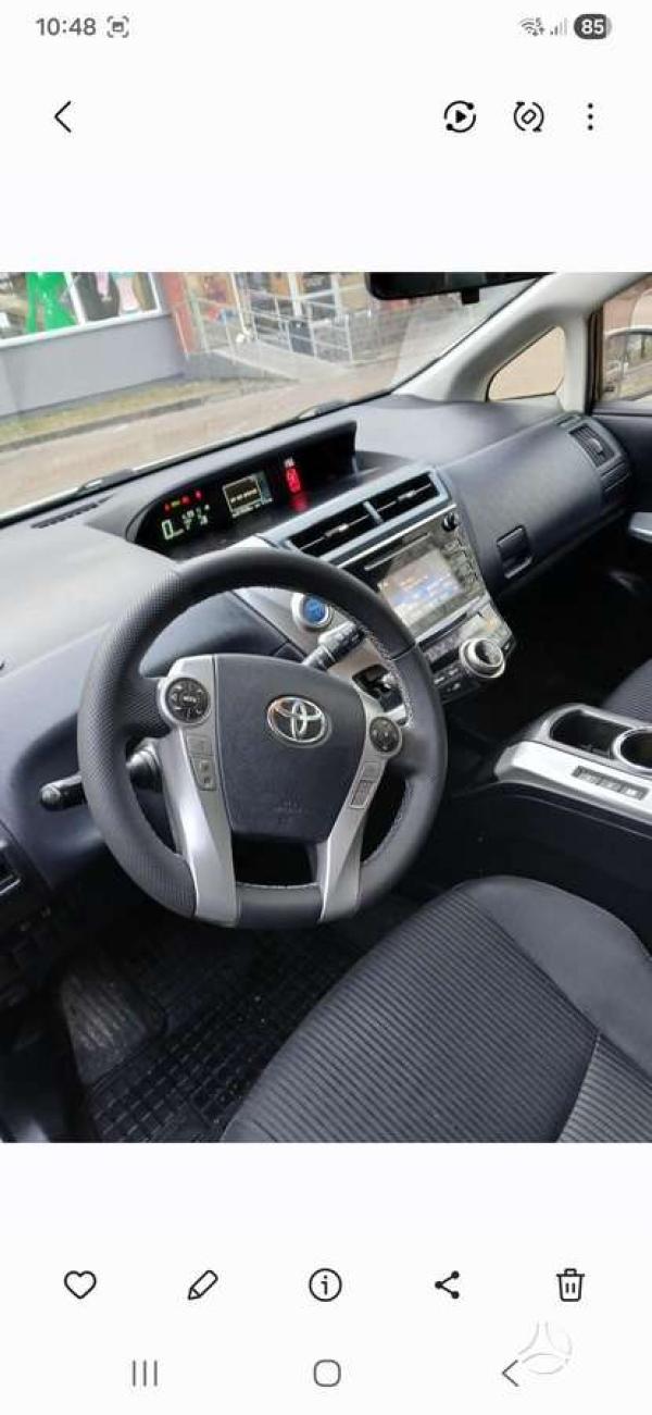 White Toyota Prius 2019 in Riga, with an engine capacity of 1.80 L and mileage of 240 thousand km for 12500 €, photo 6 on AUTOMOTO.COM.LV