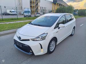White Toyota Prius 2019 in Vilnius, with an engine capacity of 1.80 L and mileage of 198 thousand km for 13490 €, photo  on AUTOMOTO.COM.LV