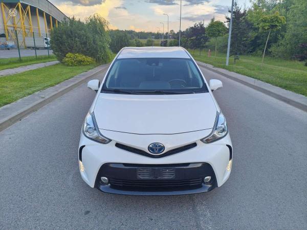 White Toyota Prius 2019 in Vilnius, with an engine capacity of 1.80 L and mileage of 198 thousand km for 13490 €, photo 2 on AUTOMOTO.COM.LV