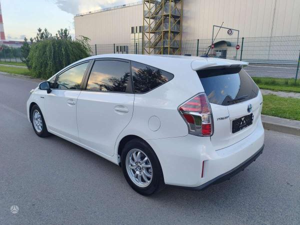 White Toyota Prius 2019 in Vilnius, with an engine capacity of 1.80 L and mileage of 198 thousand km for 13490 €, photo 6 on AUTOMOTO.COM.LV