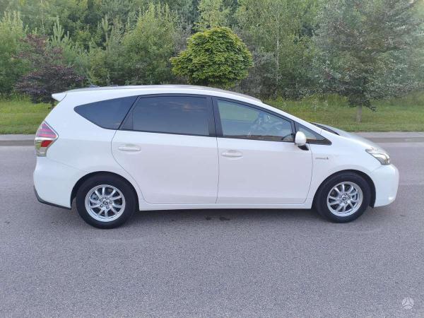 White Toyota Prius 2019 in Vilnius, with an engine capacity of 1.80 L and mileage of 198 thousand km for 13490 €, photo 8 on AUTOMOTO.COM.LV