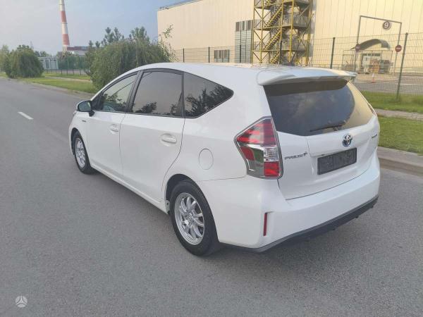 White Toyota Prius 2019 in Vilnius, with an engine capacity of 1.80 L and mileage of 221 thousand km for 12700 €, photo 6 on AUTOMOTO.COM.LV