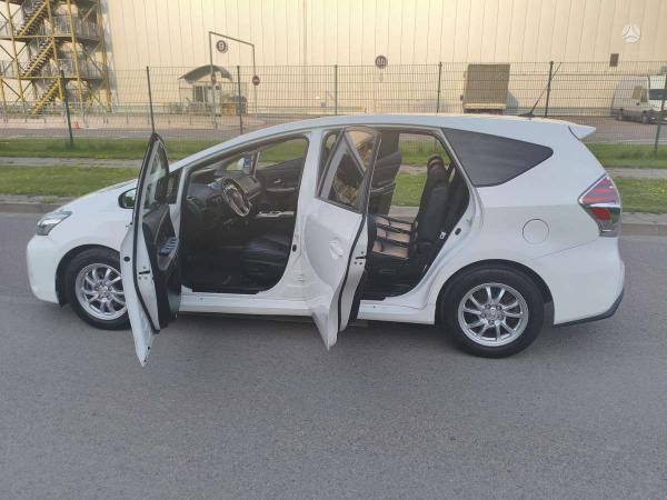 White Toyota Prius 2019 in Vilnius, with an engine capacity of 1.80 L and mileage of 221 thousand km for 12700 €, photo 9 on AUTOMOTO.COM.LV