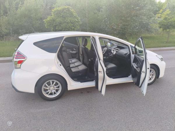 White Toyota Prius 2019 in Vilnius, with an engine capacity of 1.80 L and mileage of 221 thousand km for 12700 €, photo 10 on AUTOMOTO.COM.LV