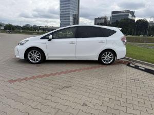 White Toyota Prius 2020 in Vilnius, with an engine capacity of 1.80 L and mileage of 302 thousand km for 12500 €, photo 5 on AUTOMOTO.COM.LV
