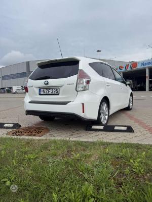 White Toyota Prius 2020 in Vilnius, with an engine capacity of 1.80 L and mileage of 302 thousand km for 12500 €, photo 7 on AUTOMOTO.COM.LV