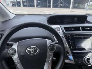 White Toyota Prius 2020 in Vilnius, with an engine capacity of 1.80 L and mileage of 302 thousand km for 12500 €, photo 15 on AUTOMOTO.COM.LV