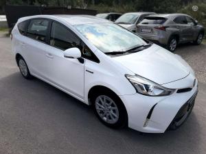 White Toyota Prius 2020 in Vilnius, with an engine capacity of 1.80 L and mileage of 193 thousand km for 12900 €, photo 3 on AUTOMOTO.COM.LV