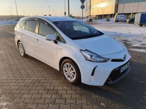 White Toyota Prius 2017 in Vilnius, with an engine capacity of 1.80 L and mileage of 226 thousand km for 11250 €, photo  on AUTOMOTO.COM.LV