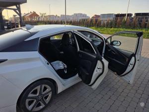 Balts Toyota Prius 2018 Klaipėda, ar dzinēja tilpumu 1.80 L un nobraukumu 242 tūkst. km par 11500 €, foto 19 vietnē AUTOMOTO.COM.LV