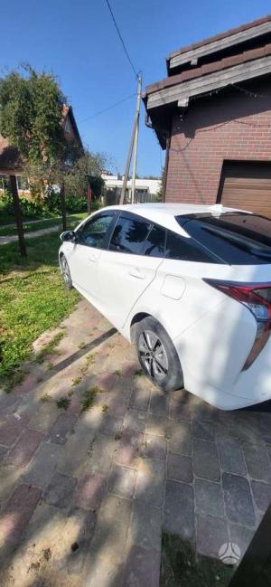 White Toyota Prius 2019 in Vilnius, with an engine capacity of 1.80 L and mileage of 192 thousand km for 11500 €, photo 18 on AUTOMOTO.COM.LV