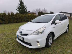 White Toyota Prius 2013 in Vilnius, with an engine capacity of 1.80 L and mileage of 415 thousand km for 7560 €, photo  on AUTOMOTO.COM.LV