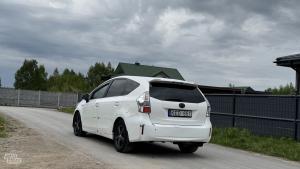White Toyota Prius 2014 in Vilnius, with an engine capacity of 1.80 L and mileage of 400 thousand km for 6950 €, photo 10 on AUTOMOTO.COM.LV
