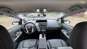 White Toyota Prius 2014 in Vilnius, with an engine capacity of 1.80 L and mileage of 400 thousand km for 6950 €, photo 13 on AUTOMOTO.COM.LV