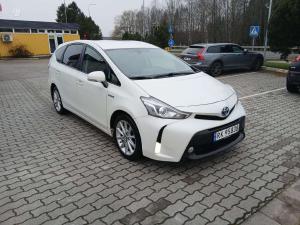 White Toyota Prius 2015 in Klaipeda, with an engine capacity of 0.00 L and mileage of 365 thousand km for 8350 €, photo 6 on AUTOMOTO.COM.LV