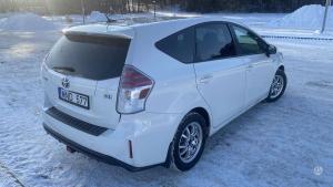 White Toyota Prius 2015 in Vilnius, with an engine capacity of 1.80 L and mileage of 291 thousand km for 9500 €, photo 3 on AUTOMOTO.COM.LV