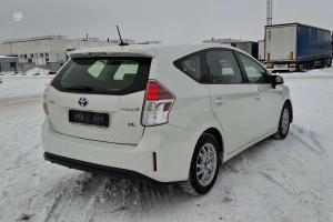 White Toyota Prius 2016 in Panevezys, with an engine capacity of 1.80 L and mileage of 282 thousand km for 8900 €, photo 4 on AUTOMOTO.COM.LV