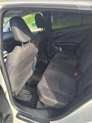 White Toyota Prius 2017 in Kaunas, with an engine capacity of 1.80 L and mileage of 375 thousand km for 10195 €, photo 9 on AUTOMOTO.COM.LV