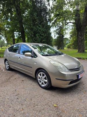 Dzeltens Toyota Prius 2006 Viļņa, ar dzinēja tilpumu 1.50 L un nobraukumu 273 tūkst. km par 3999 €, foto 4 vietnē AUTOMOTO.COM.LV