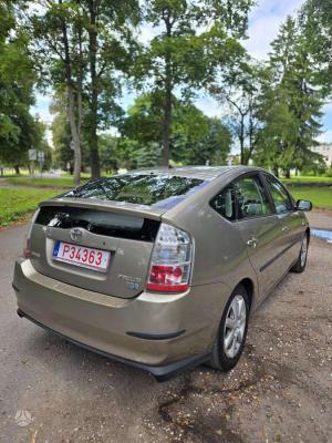 Dzeltens Toyota Prius 2006 Viļņa, ar dzinēja tilpumu 1.50 L un nobraukumu 273 tūkst. km par 3999 €, foto 6 vietnē AUTOMOTO.COM.LV
