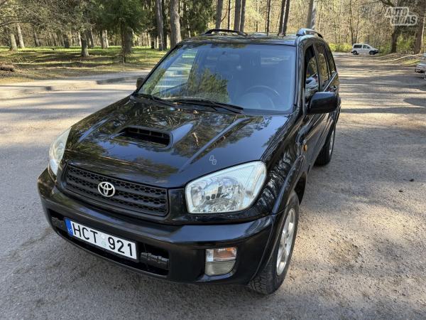 Melns Toyota RAV4 2003 Alīta, ar dzinēja tilpumu 2.00 L un nobraukumu 288 tūkst. km par 2950 €, foto 2 vietnē AUTOMOTO.COM.LV