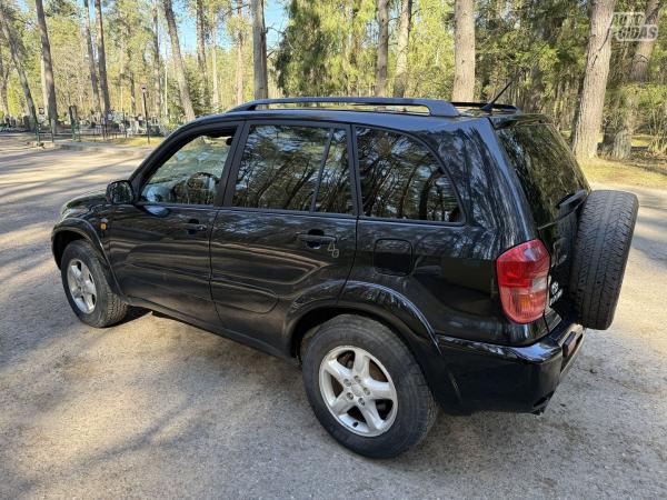 Melns Toyota RAV4 2003 Alīta, ar dzinēja tilpumu 2.00 L un nobraukumu 288 tūkst. km par 2950 €, foto 7 vietnē AUTOMOTO.COM.LV