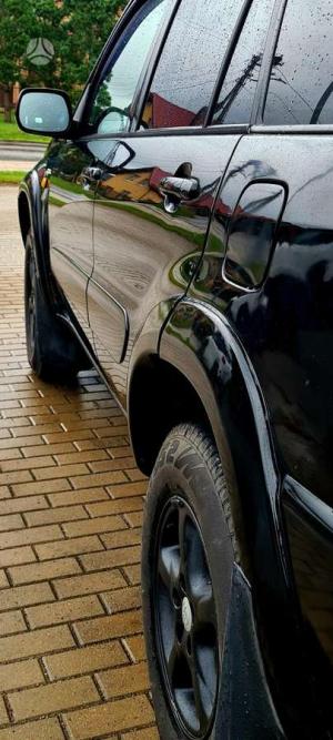 Melns Toyota RAV4 2003 Viļņa, ar dzinēja tilpumu 2.00 L un nobraukumu 280 tūkst. km par 4300 €, foto 25 vietnē AUTOMOTO.COM.LV