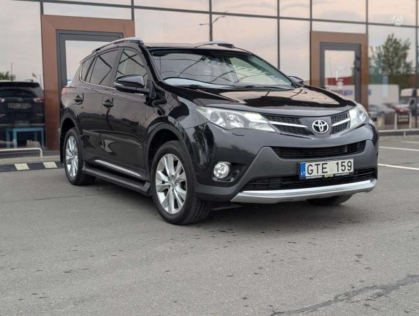 Black Toyota RAV4 2013 in Vilnius, with an engine capacity of 2.23 L and mileage of 245 thousand km for 11000 €, photo 1 on AUTOMOTO.COM.LV