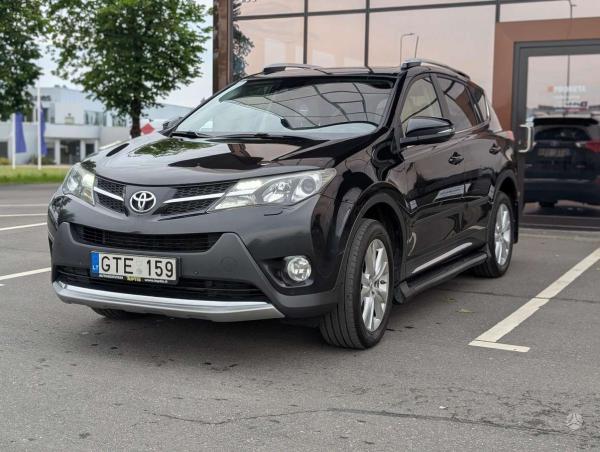 Black Toyota RAV4 2013 in Vilnius, with an engine capacity of 2.23 L and mileage of 245 thousand km for 11000 €, photo 4 on AUTOMOTO.COM.LV