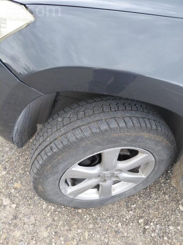 Grey Toyota RAV4 2009 in Riga, with an engine capacity of 2.20 L and mileage of 256 thousand km for 5500 €, photo 10 on AUTOMOTO.COM.LV