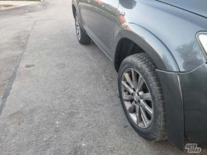 Grey Toyota RAV4 2012 in Pasvalys, with an engine capacity of 2.20 L and mileage of 301 thousand km for 4950 €, photo 18 on AUTOMOTO.COM.LV