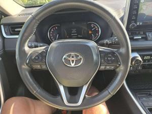 Grey Toyota RAV4 2021 in Siauliai, with an engine capacity of 1.99 L and mileage of 100 thousand km for 13900 €, photo 11 on AUTOMOTO.COM.LV