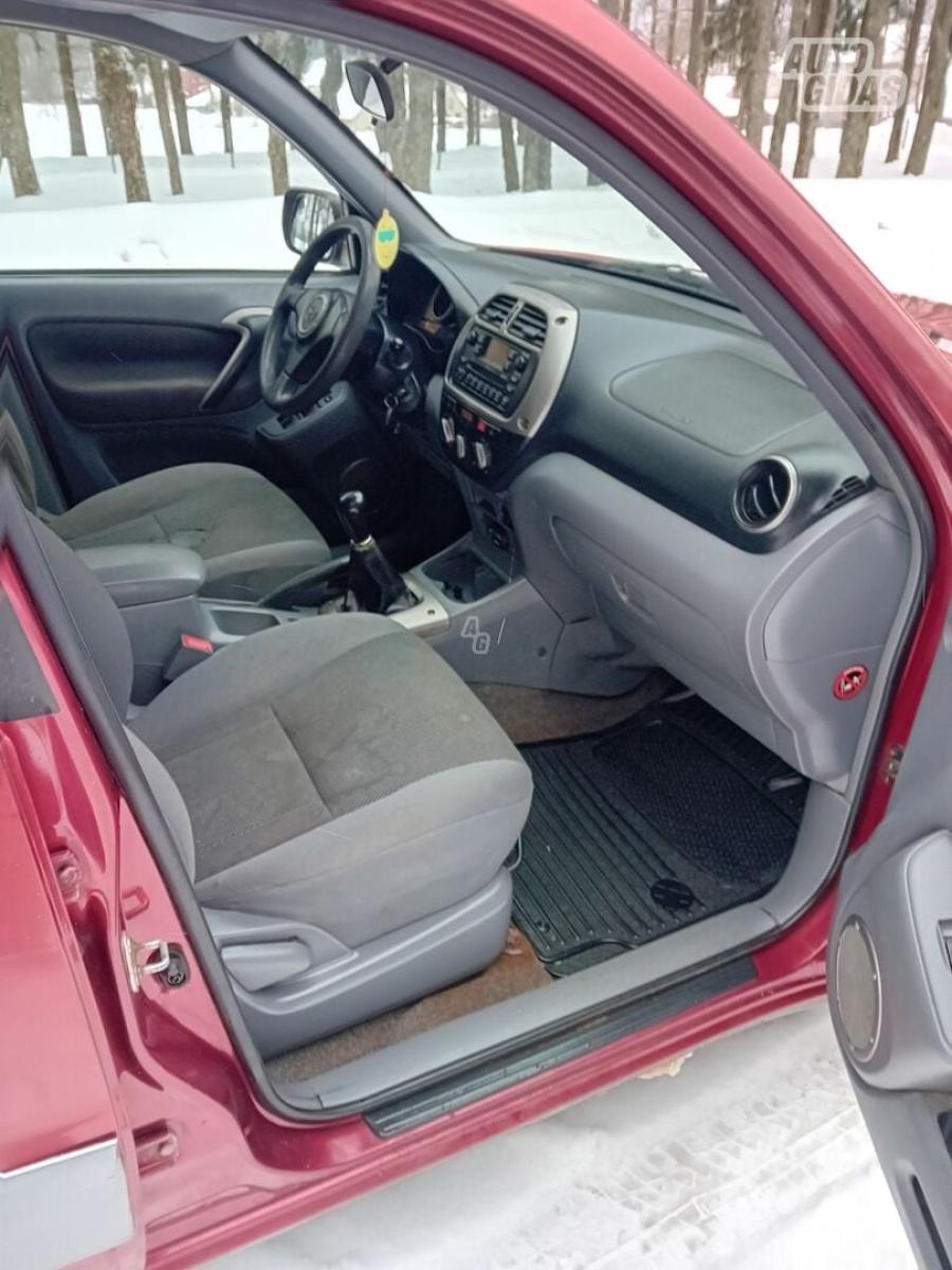 Red Toyota RAV4 2003 in Vilnius, with an engine capacity of 2.00 L and mileage of 287 thousand km for 1950 €, photo 12 on AUTOMOTO.COM.LV