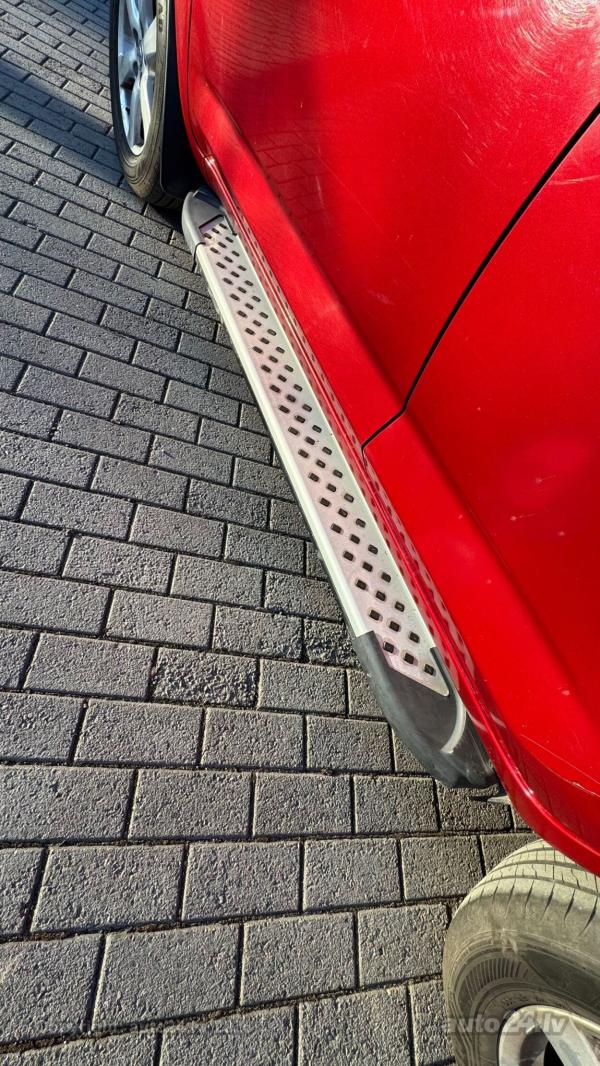 Red Toyota RAV4 2009 in Tallinn, with an engine capacity of 2.00 L and mileage of 167 thousand km for 7999 €, photo 11 on AUTOMOTO.COM.LV