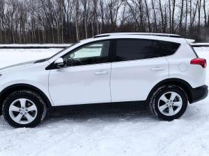 White Toyota RAV4 2014 in Siauliai, with an engine capacity of 2.00 L and mileage of 228 thousand km for 10700 €, photo 5 on AUTOMOTO.COM.LV