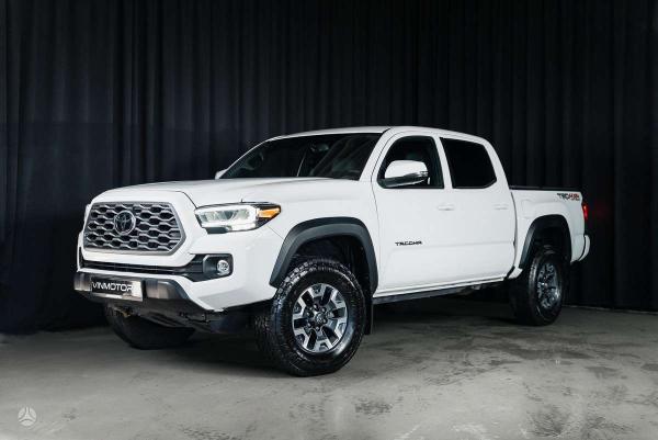 White Toyota Tacoma 2021 in Vilnius, with an engine capacity of 3.46 L and mileage of 15 thousand km for 51999 €, photo 1 on AUTOMOTO.COM.LV