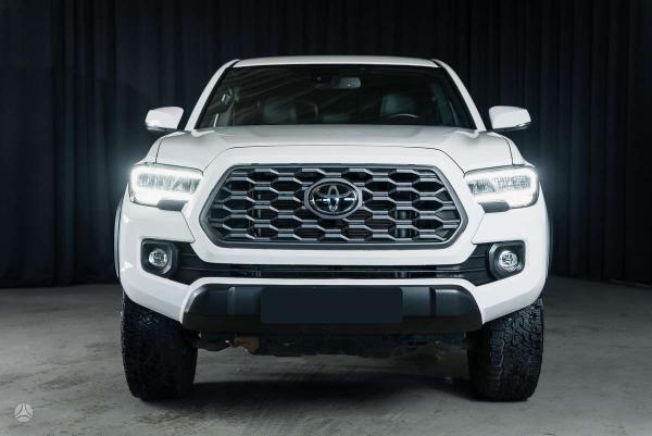 White Toyota Tacoma 2021 in Vilnius, with an engine capacity of 3.46 L and mileage of 15 thousand km for 51999 €, photo 2 on AUTOMOTO.COM.LV