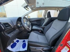 Red Toyota Verso-S 2014 in Riga, with an engine capacity of 1.40 L and mileage of 230 thousand km for 4750 €, photo 11 on AUTOMOTO.COM.LV