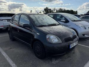 Black Toyota Yaris 1999 in Vilnius, with an engine capacity of 1.00 L and mileage of 250 thousand km for 250 €, photo  on AUTOMOTO.COM.LV