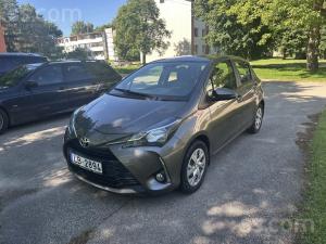 Brown Toyota Yaris 2017 in Riga, with an engine capacity of 1.50 L and mileage of 125 thousand km for 8995 €, photo  on AUTOMOTO.COM.LV