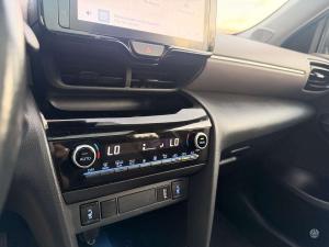 Black Toyota Yaris Cross 2021 in Vilnius, with an engine capacity of 1.49 L and mileage of 93 thousand km for 22500 €, photo 38 on AUTOMOTO.COM.LV
