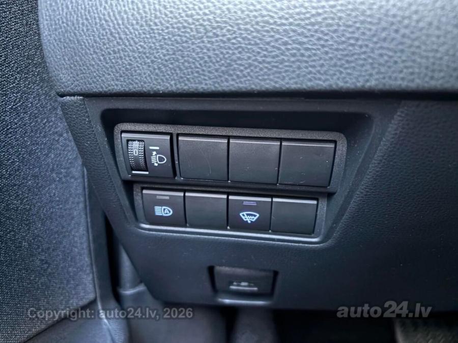 Черный Тойота Yaris Cross 2022 в Таллин, объемом двигателя 1.49 л и пробегом 65 тыс. км за 19995 €, фото 15 на AUTOMOTO.COM.LV