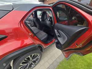 Red Toyota Yaris Cross 2022 in Kaunas, with an engine capacity of 1.49 L and mileage of 33 thousand km for 25000 €, photo 11 on AUTOMOTO.COM.LV