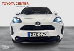 Белый Тойота Yaris Cross 2023 в Каунас, объемом двигателя 0.00 л и пробегом 24 тыс. км за 32746 €, фото 2 на AUTOMOTO.COM.LV
