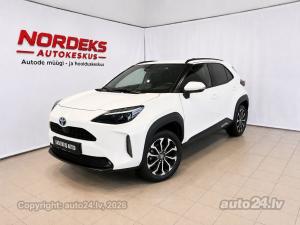 Balts Toyota Yaris Cross 2024 Tallina, ar dzinēja tilpumu 1.50 L un nobraukumu 75 tūkst. km par 22990 €, foto  vietnē AUTOMOTO.COM.LV