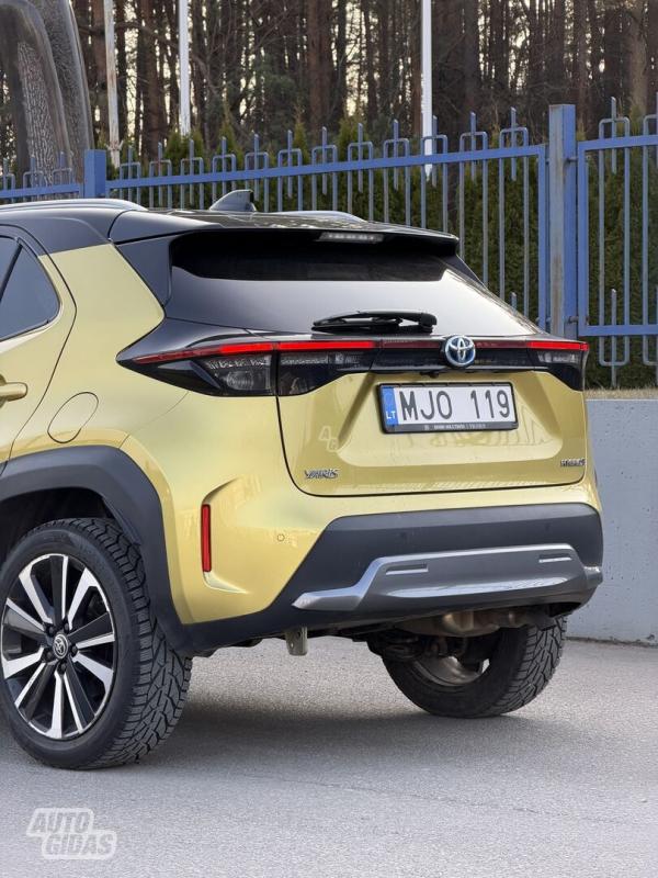Yellow Toyota Yaris Cross 2022 in Vilnius, with an engine capacity of 1.50 L and mileage of 66 thousand km for 20000 €, photo 4 on AUTOMOTO.COM.LV