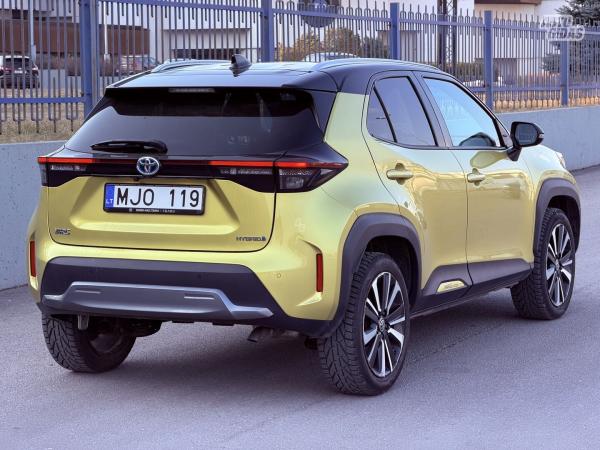 Yellow Toyota Yaris Cross 2022 in Vilnius, with an engine capacity of 1.50 L and mileage of 66 thousand km for 20000 €, photo 7 on AUTOMOTO.COM.LV