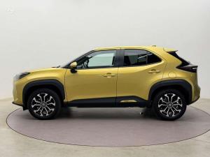 Yellow Toyota Yaris Cross 2022 in Panevezys, with an engine capacity of 1.49 L and mileage of 33 thousand km for 21990 €, photo 6 on AUTOMOTO.COM.LV