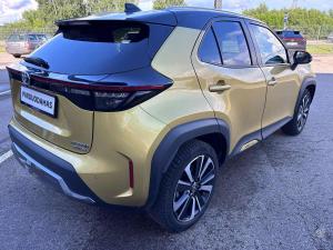 Yellow Toyota Yaris Cross 2022 in Panevezys, with an engine capacity of 1.49 L and mileage of 111 thousand km for 22999 €, photo 8 on AUTOMOTO.COM.LV