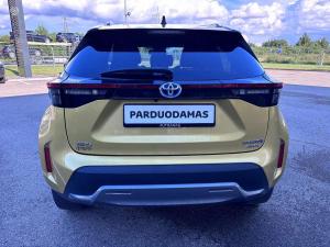 Yellow Toyota Yaris Cross 2022 in Panevezys, with an engine capacity of 1.49 L and mileage of 111 thousand km for 22999 €, photo 9 on AUTOMOTO.COM.LV
